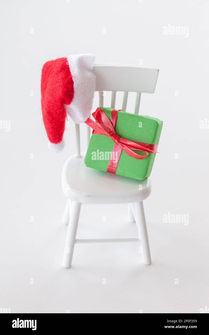 Small chair with gift Stock Photo - Alamy