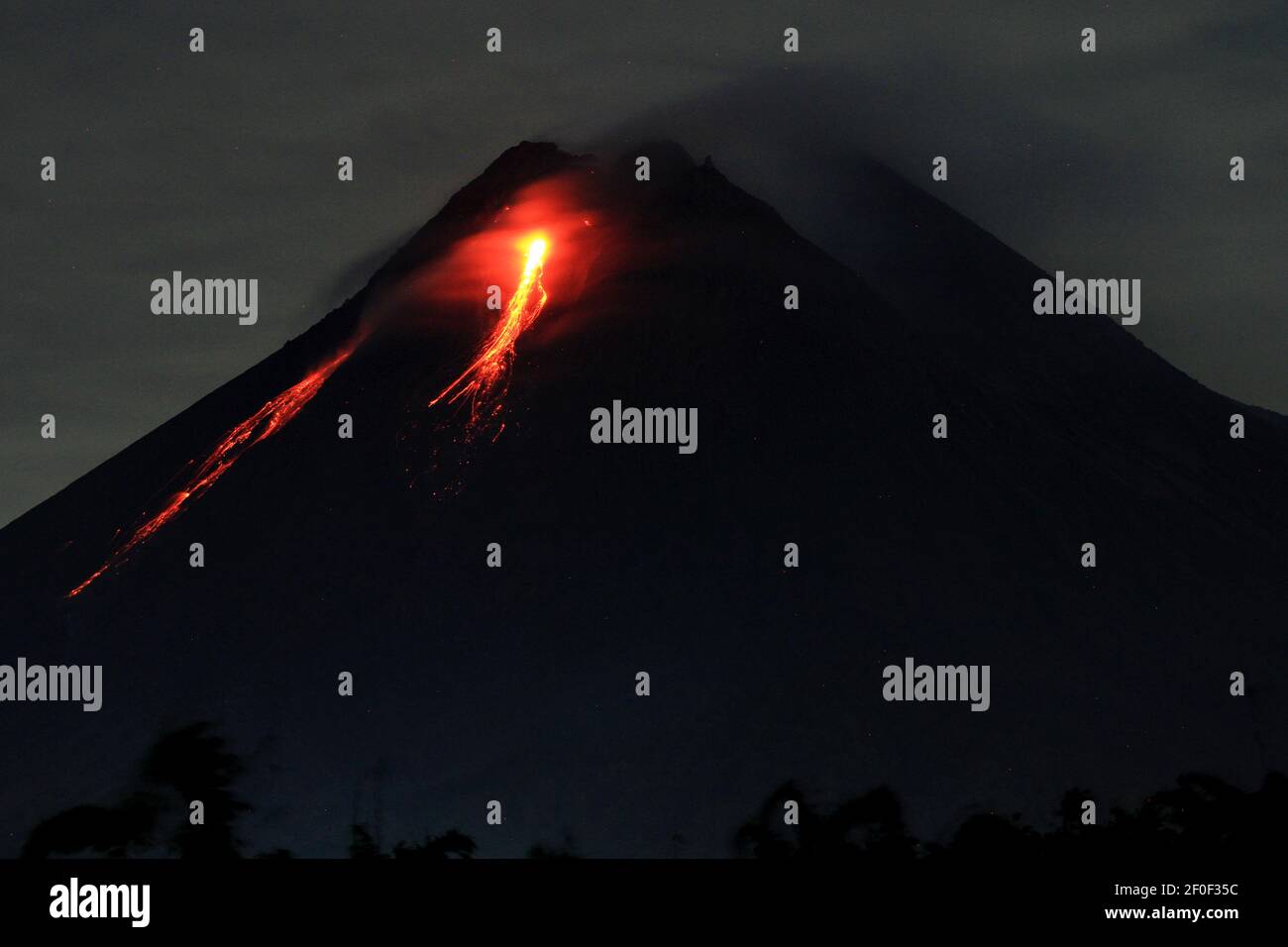 Lava flows down from the crater of Mount Merapi, Indonesia's most ...
