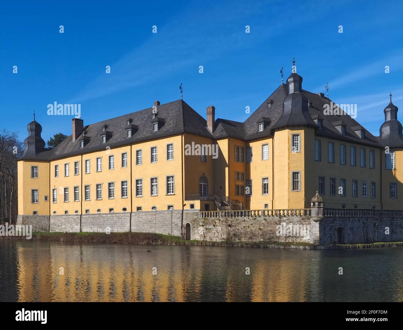 Beautiful german yellow water castle Schloss Dyck Stock Photo - Alamy