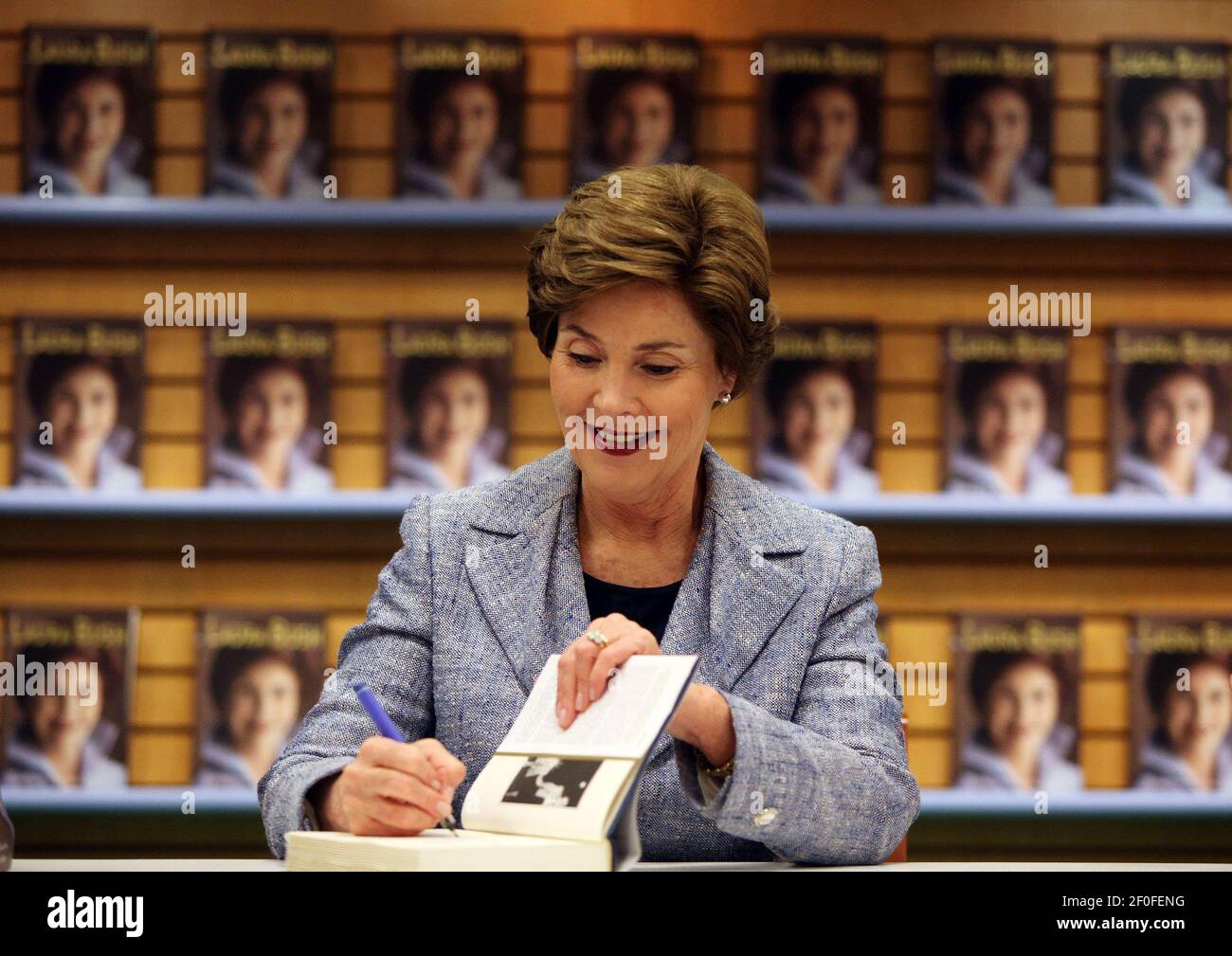 10 May 2010- Costa Mesa, California- Former First Lady Laura Bush signs ...