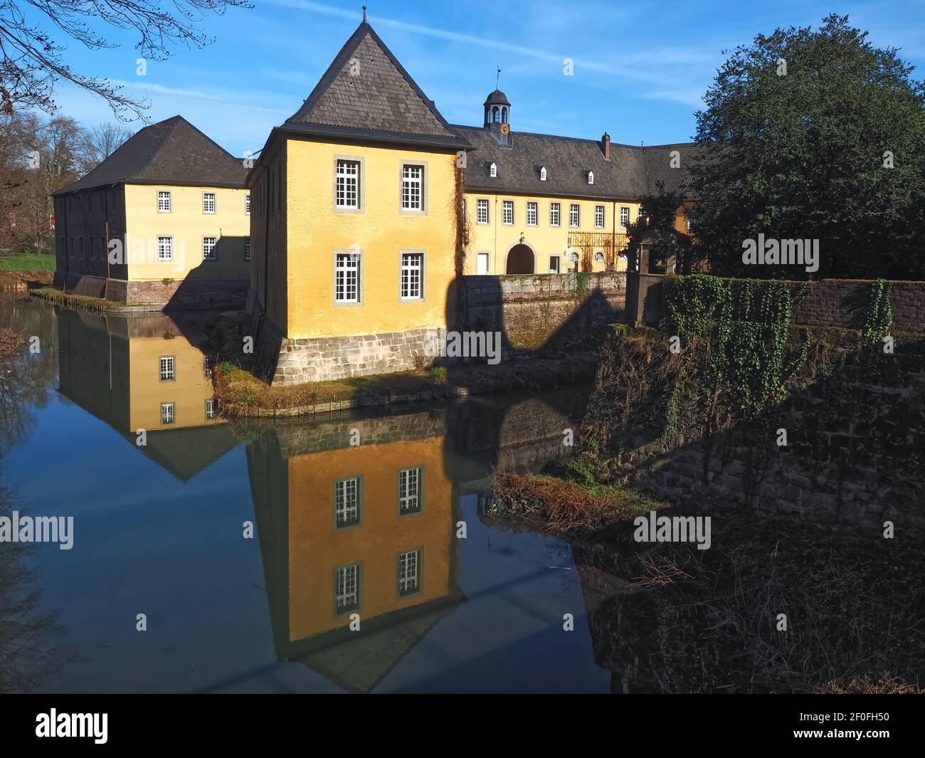Beautiful german yellow water castle Schloss Dyck Stock Photo - Alamy