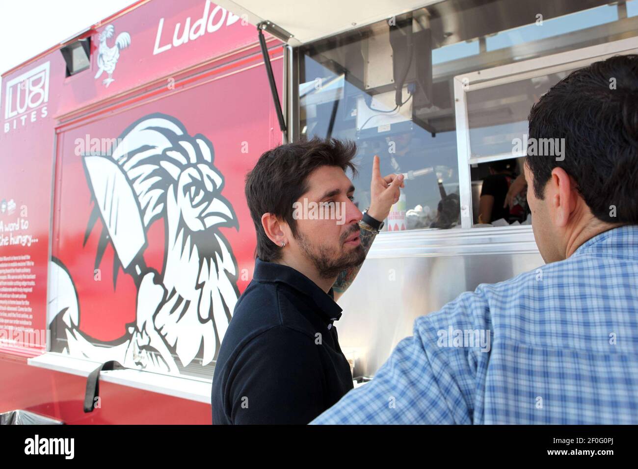 14 August 2010 - Los Angeles, CA - French chef Ludo Lefebvre consults ...