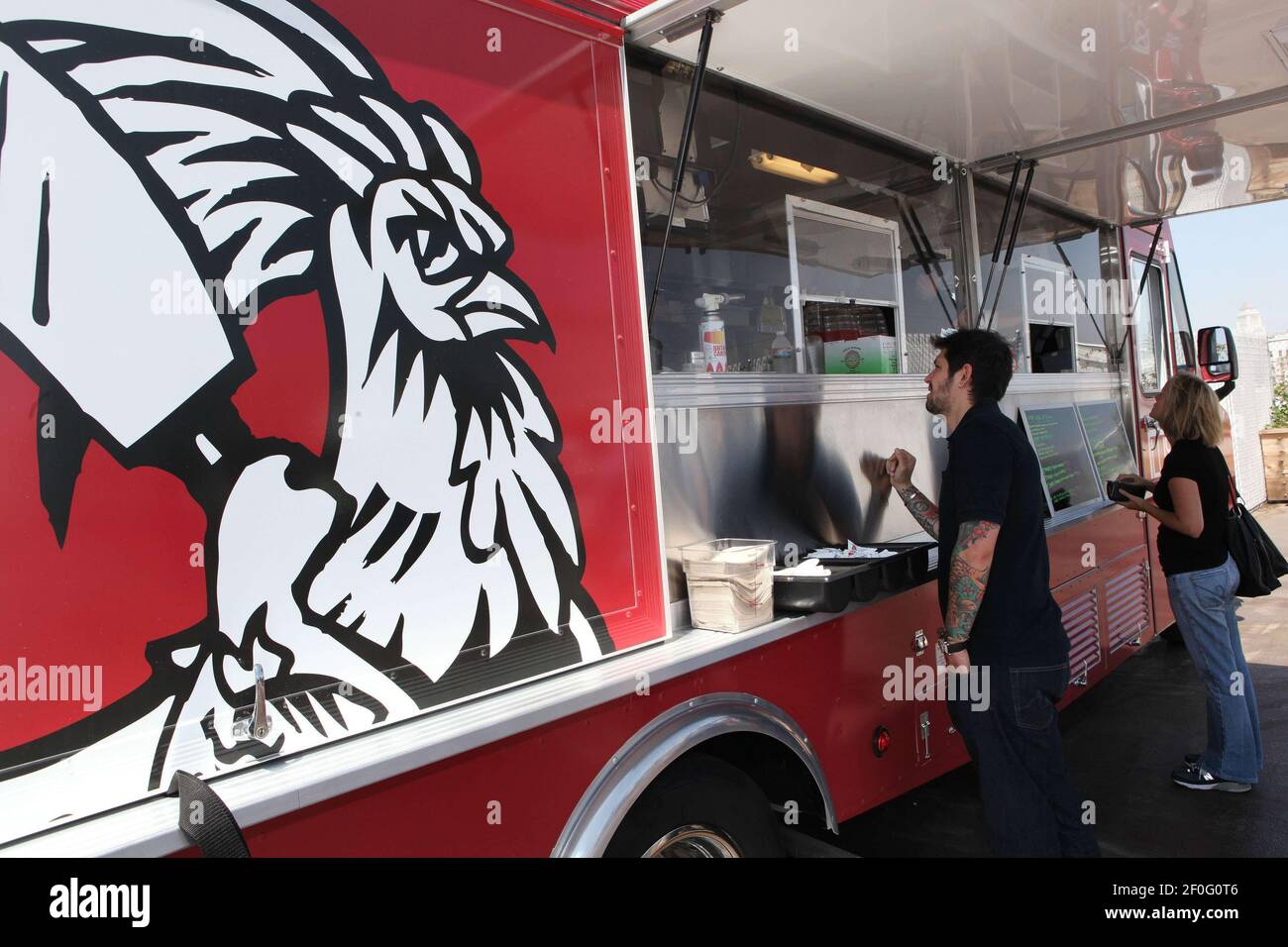 14 August 2010 - Los Angeles, CA - French chef Ludo Lefebvre consults ...