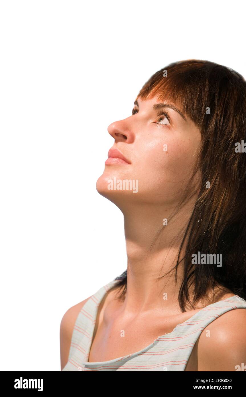 Head and shoulder partial view of a young brunette woman in casual top ...