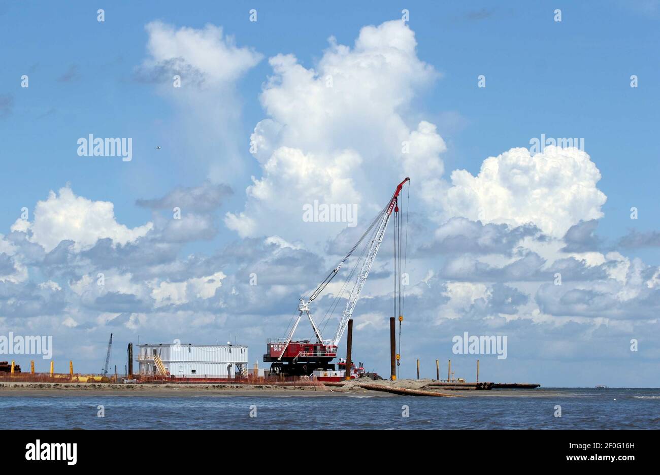21 August 2010 - East Grand Terre Island, LA - A crane and other heavy ...