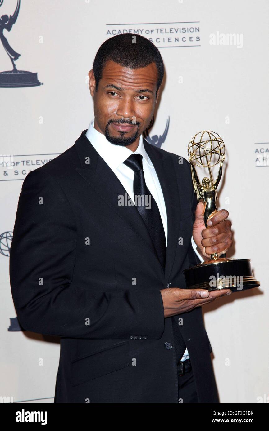 21 August 2010 - Los Angeles, CA - Isaiah Mustafa poses backstage at ...