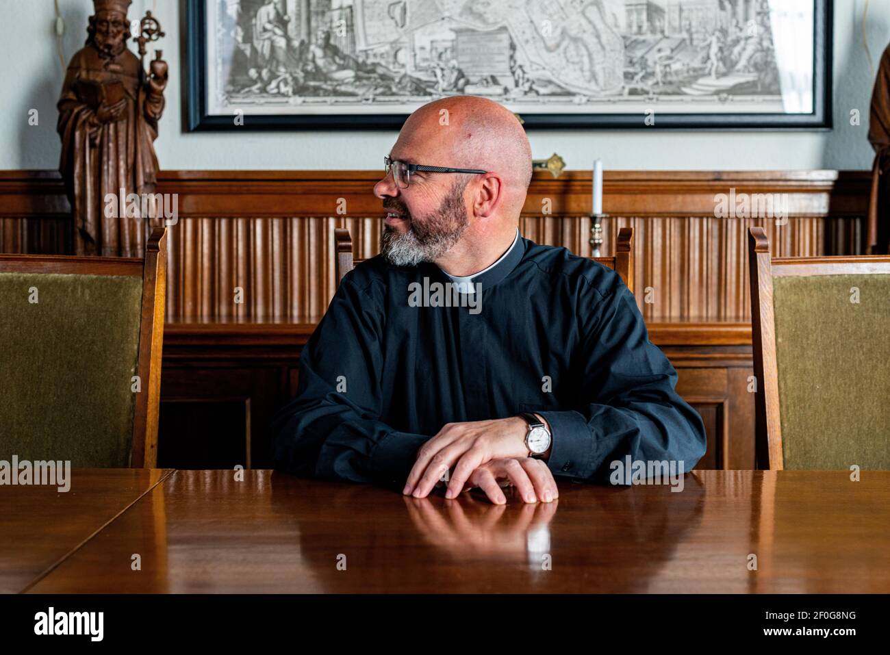 Tilburg, Netherlands. Portrait of a Belgian, Catholic Priest inside his ...