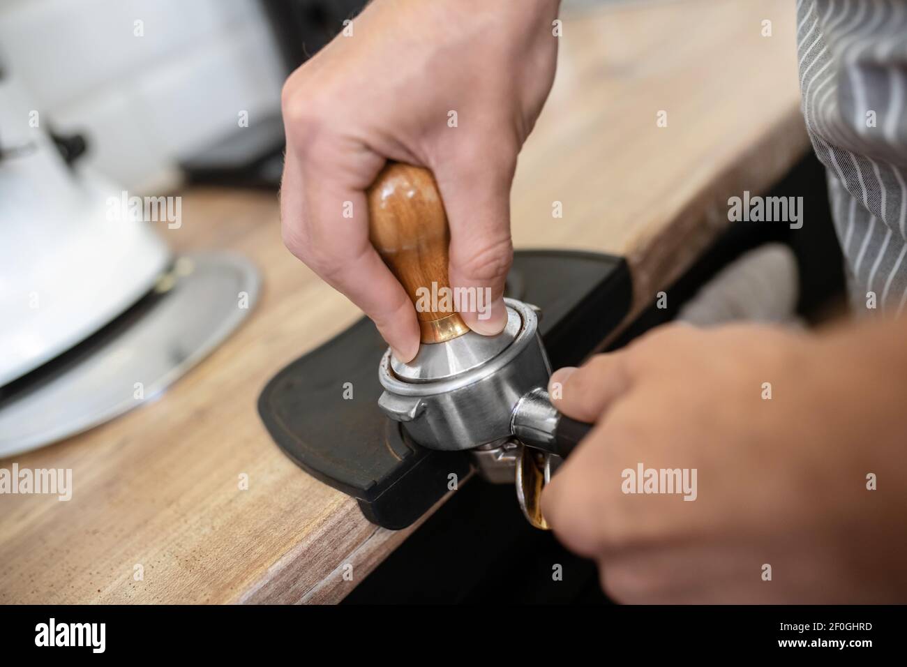 Male hands holding the filter holder handle Stock Photo - Alamy