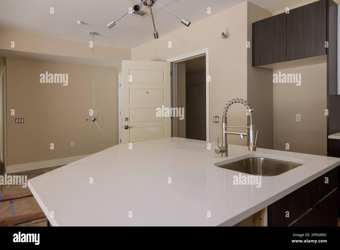 Kitchen contemporary with chrome fixture and white conter tops Stock ...