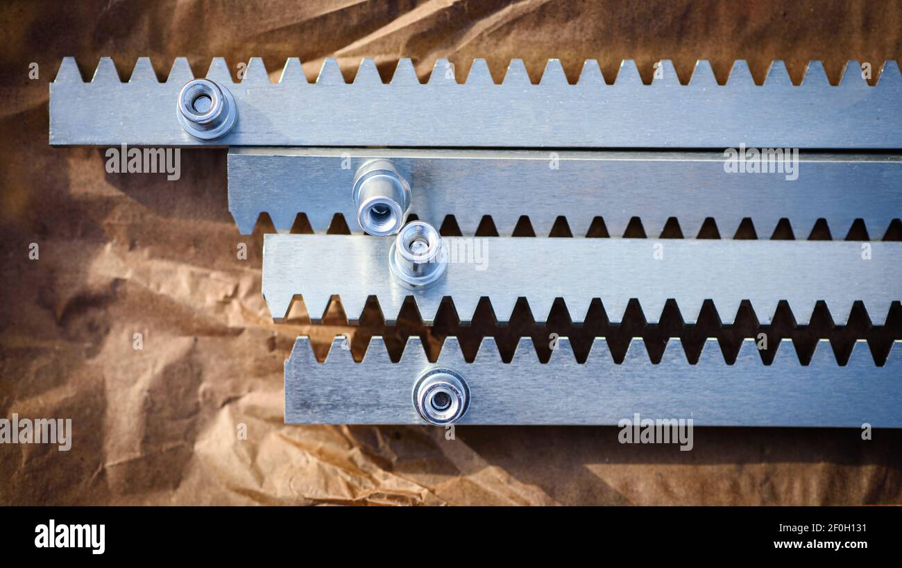 Steel gear racks, top view. Accessories of automatic cantilever sliding ...