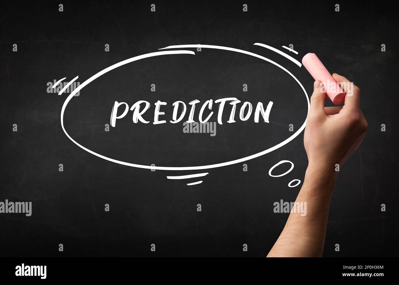 Hand drawing PREDICTION inscription with white chalk on blackboard ...