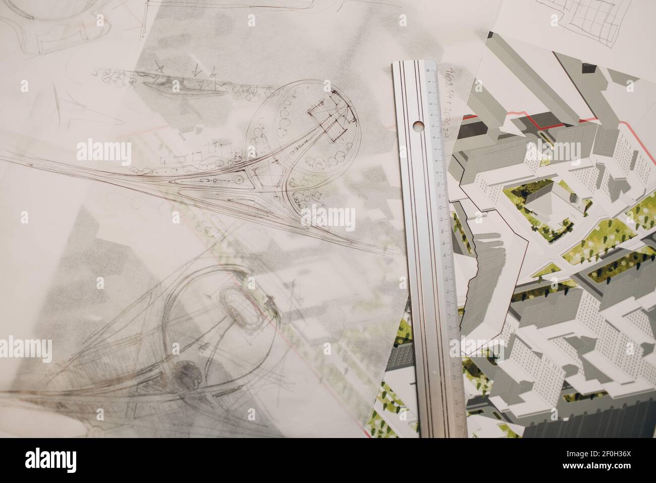 Drawings blueprints and layout design project at office table with ...