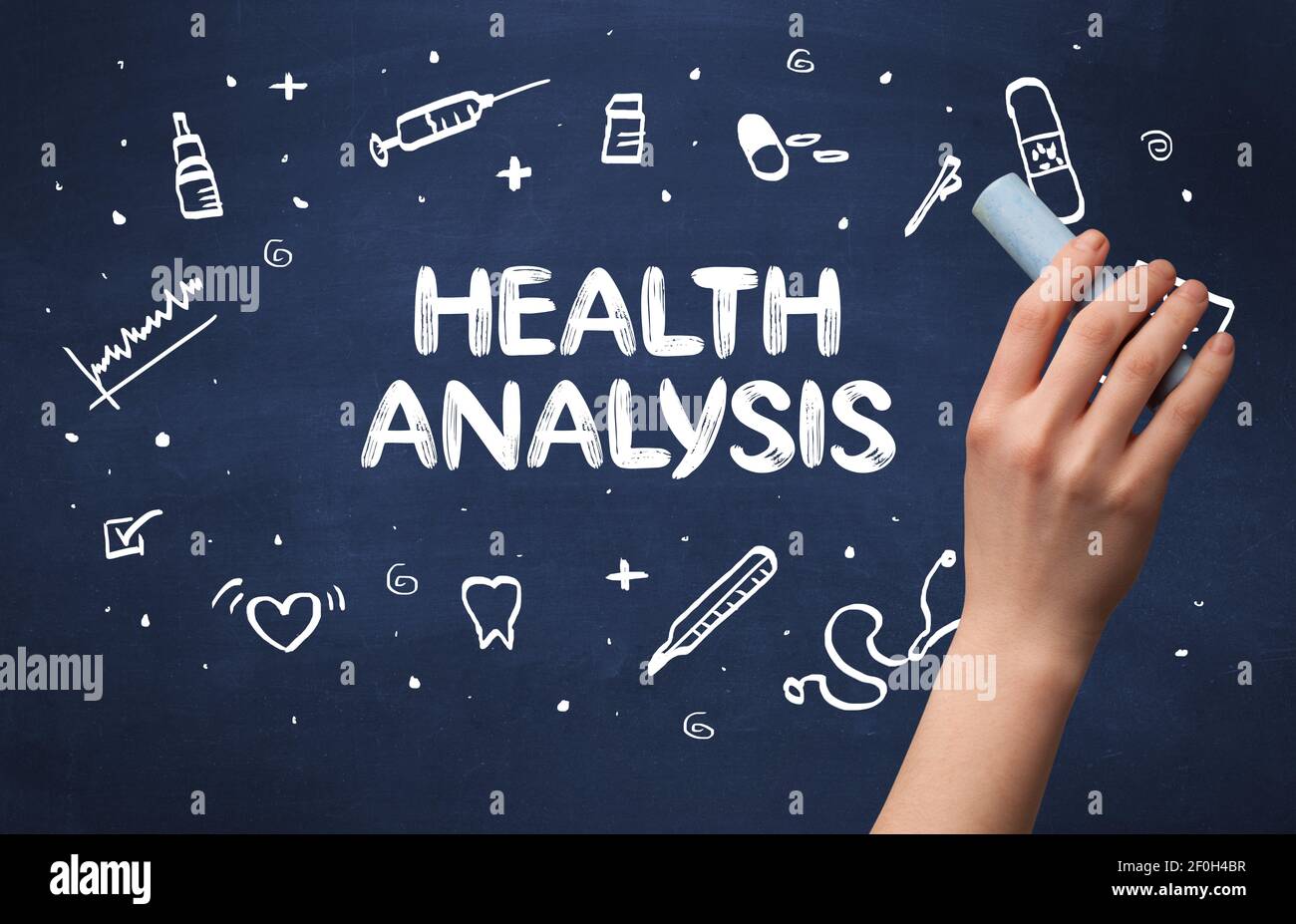 Hand drawing HEALTH ANALYSIS inscription with white chalk on blackboard ...