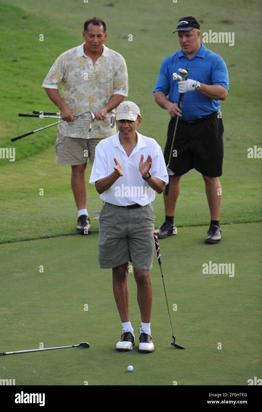 28 December 2010 - Honolulu, Hawaii - President Barack Obama cheers on ...