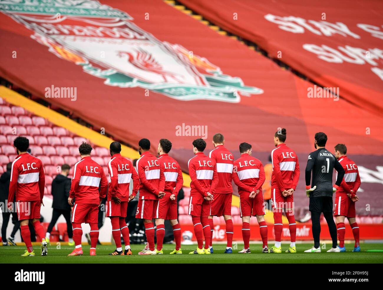Liverpool players line up for the Premier League match at Anfield ...