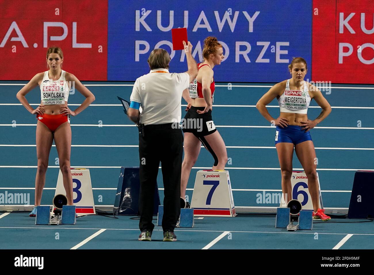 TORUN, POLAND - MARCH 7: Mathilde U.Kramer of Denmark receives a red ...
