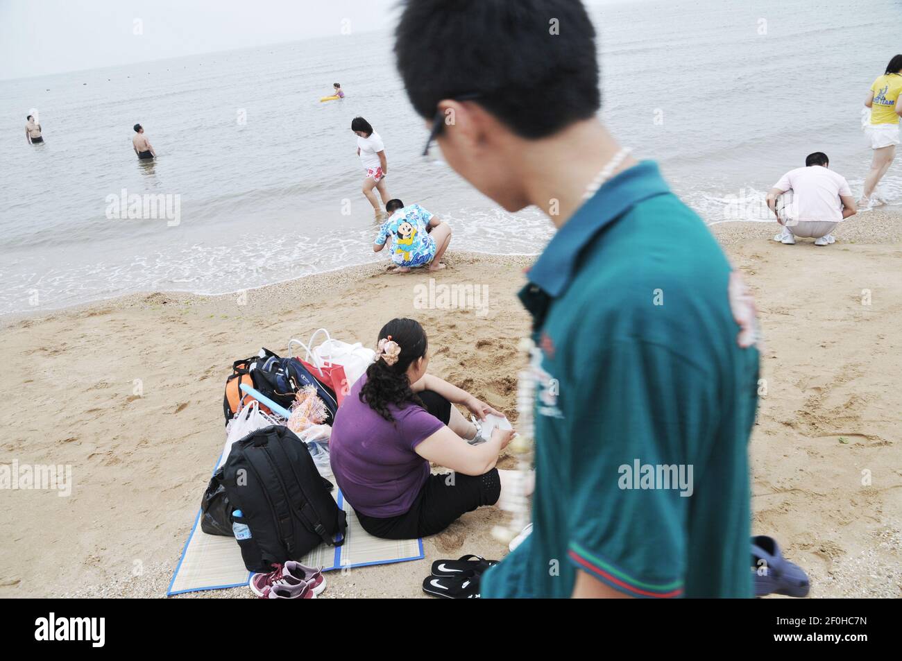 A family on Beidaihe beach. (Photo by Raphael Fournier/Sipa USA Stock ...