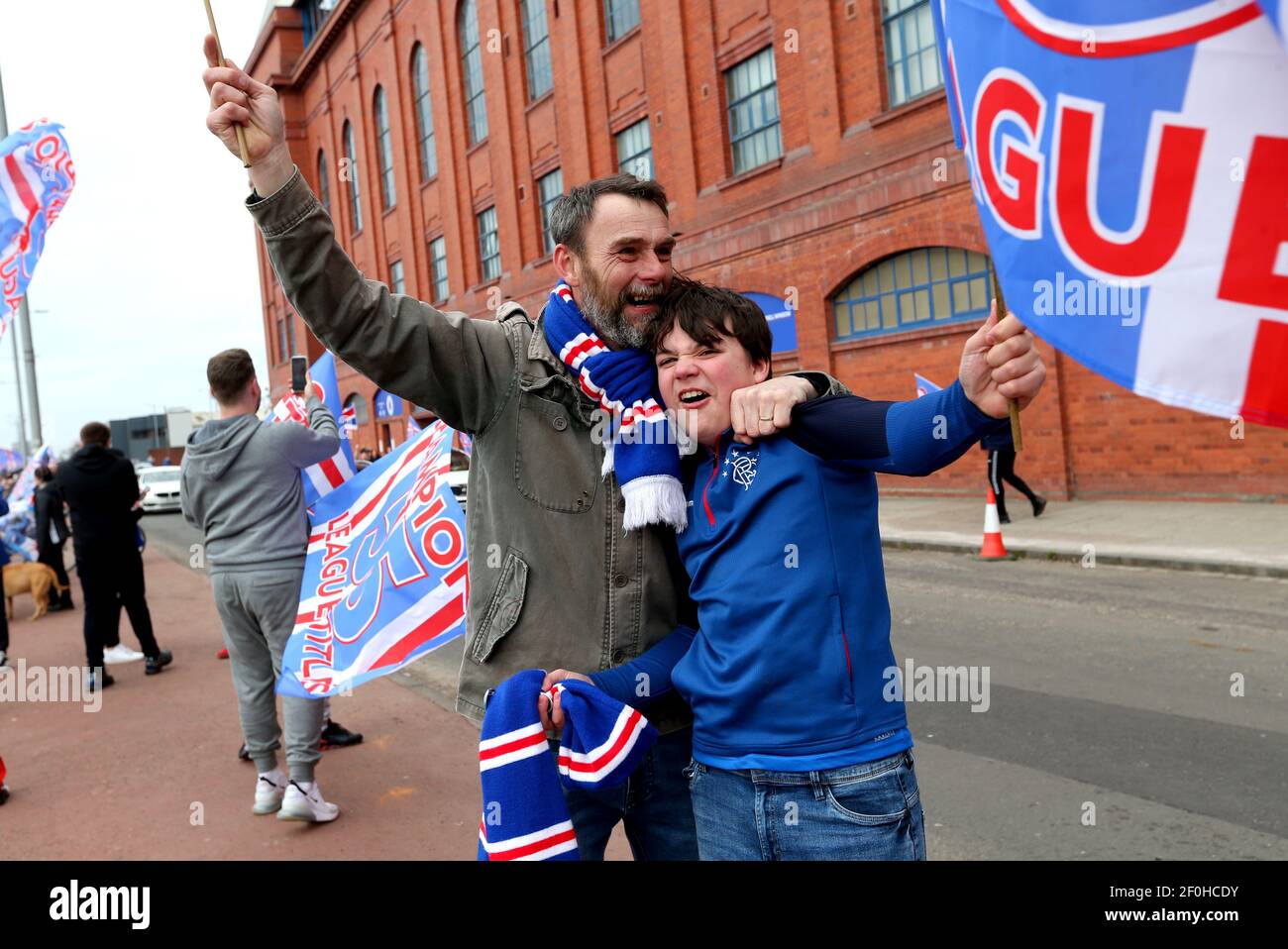 Rangers fans celebrate outside of the Ibrox Stadium after Rangers win ...