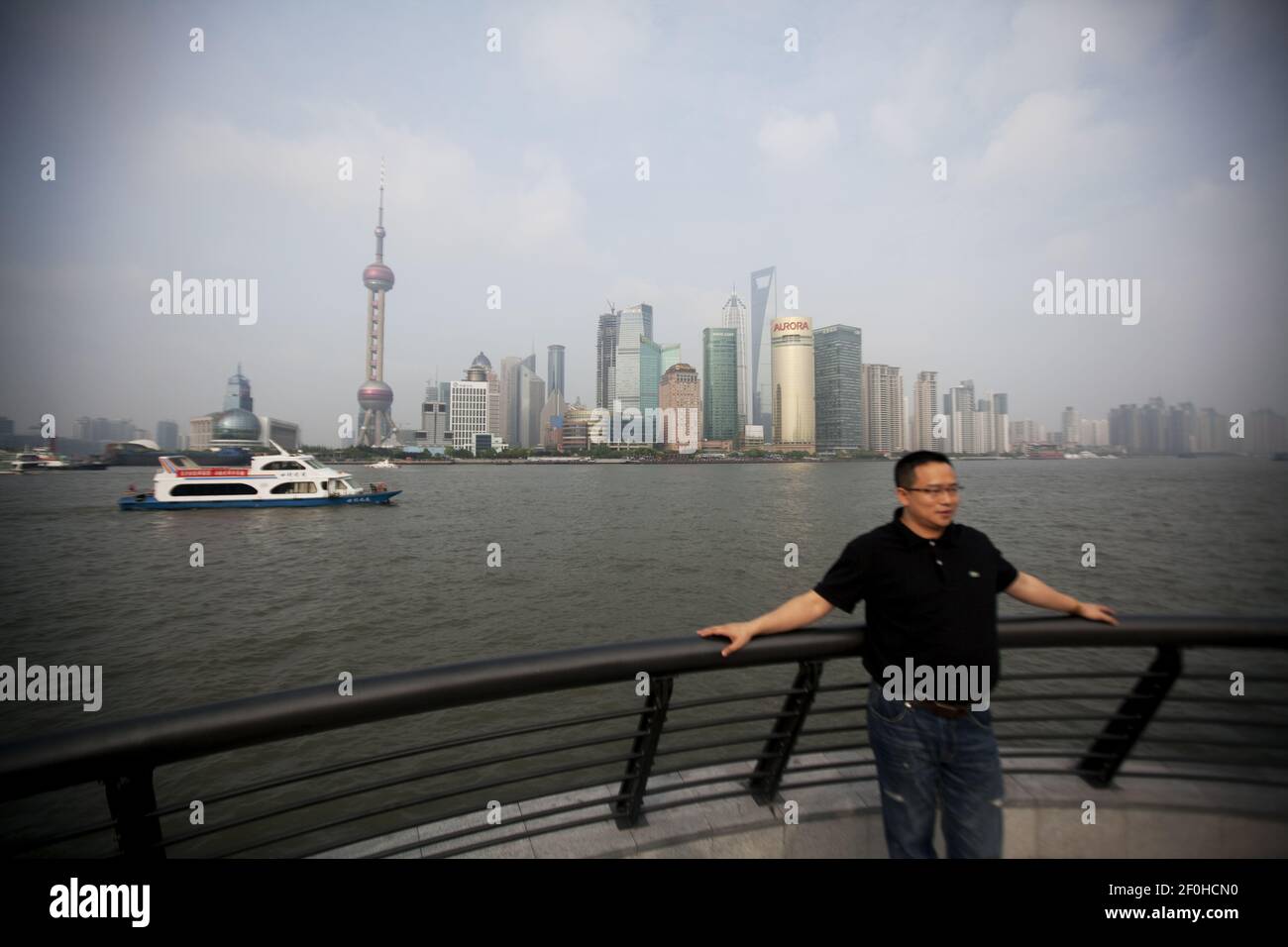 Daily life in Shanghai with the skyline of Shanghai. (Photo by Robin ...
