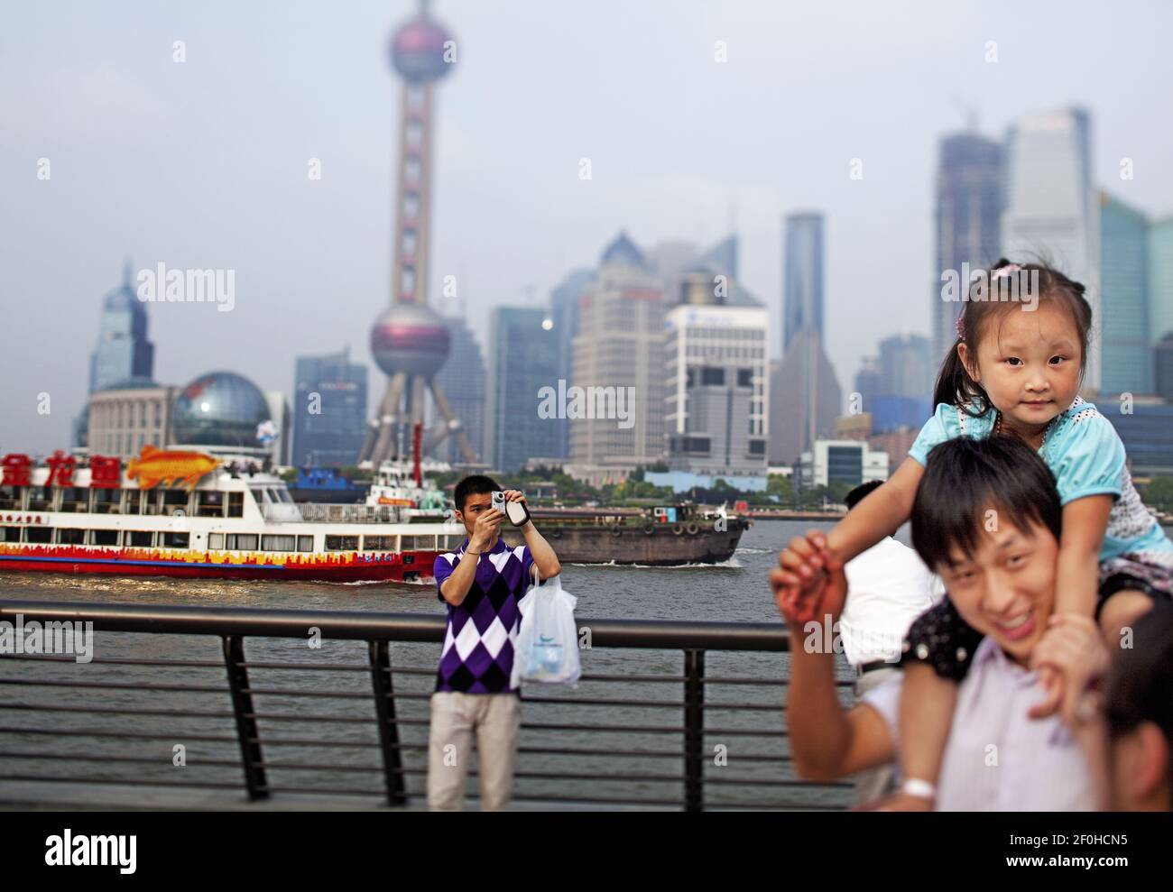 Daily life in Shanghai with the skyline of Shanghai. (Photo by Robin ...