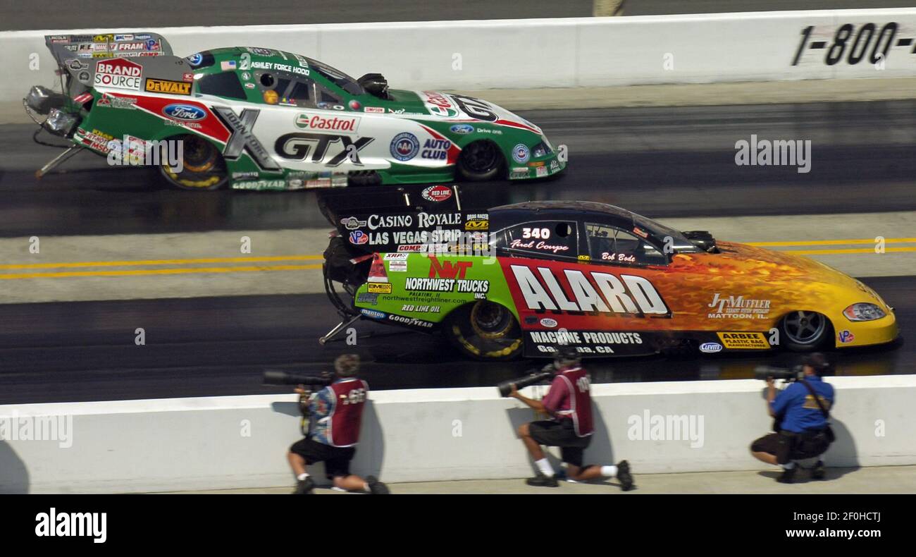 Funny Car drivers Ashley Force Hood and Bob Bode make a qualifying run ...