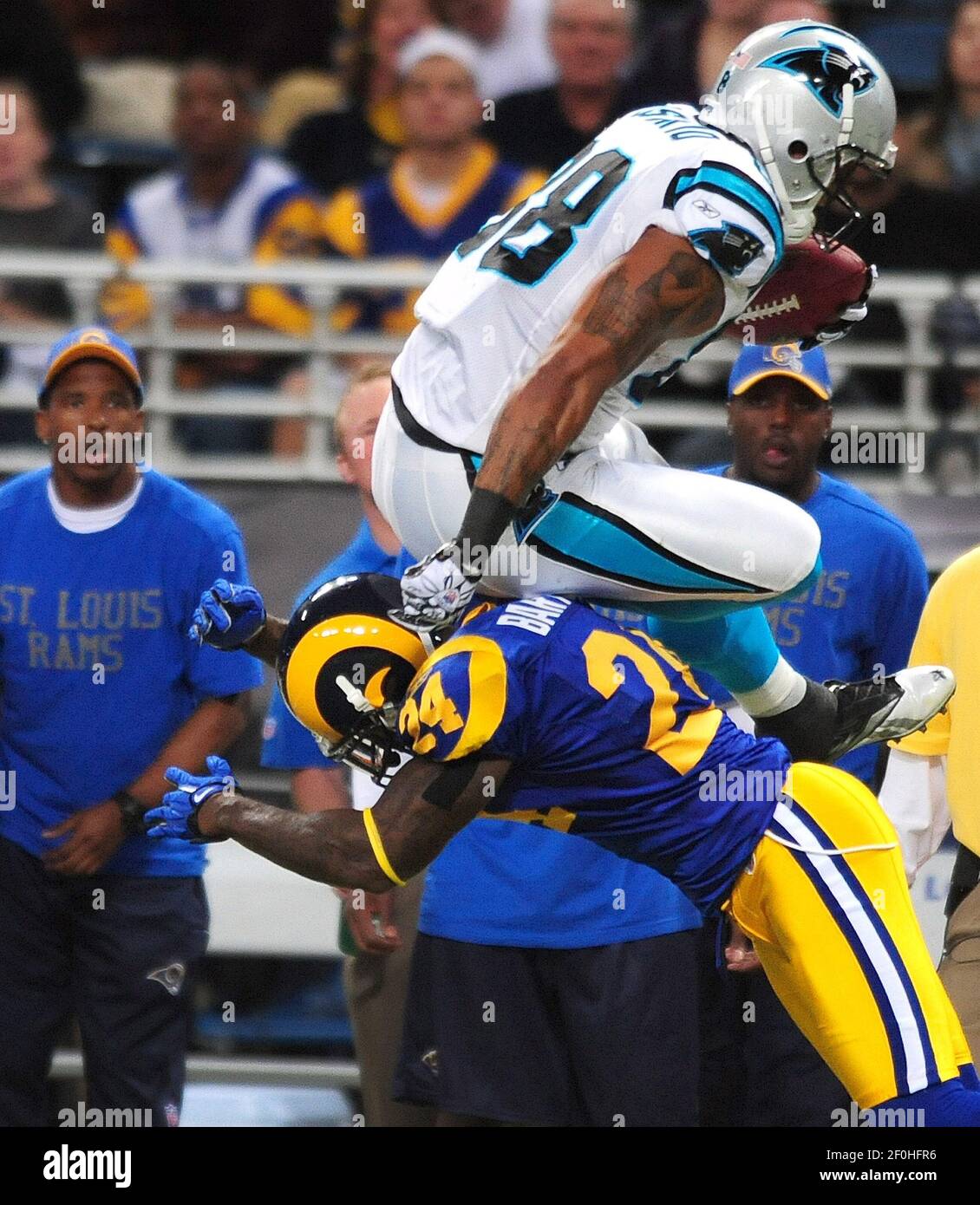 Carolina Panthers tight end Dante Rosario leaps over St. Louis Rams ...