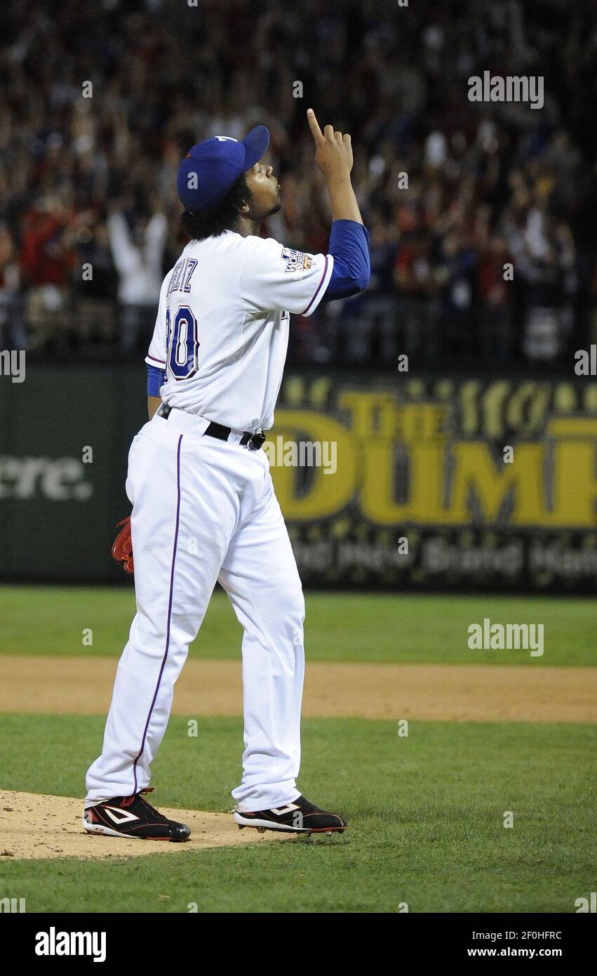 Texas Rangers relief pitcher Neftali Feliz points skyward after ...