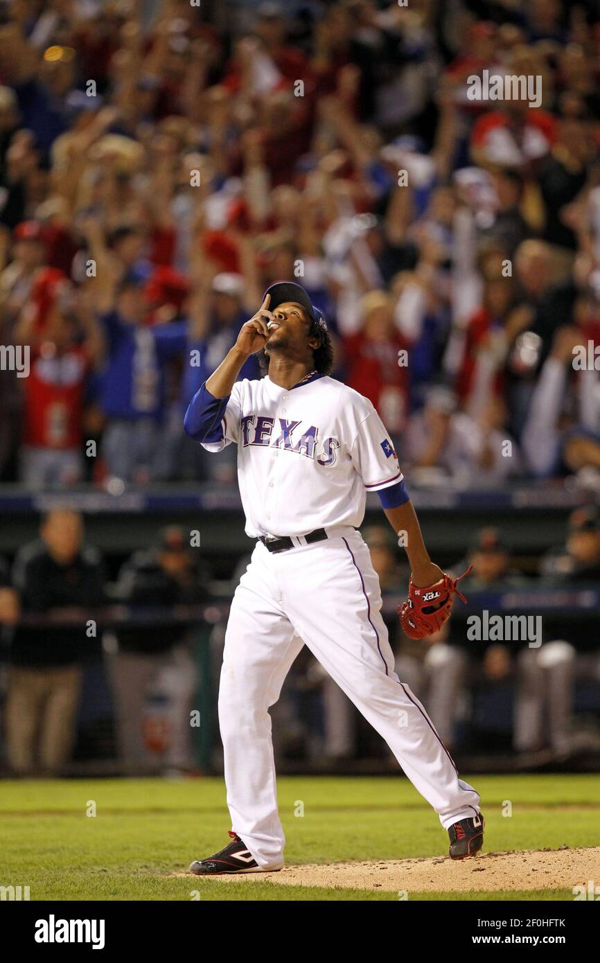 Texas Rangers relief pitcher Neftali Feliz points skyward after ...