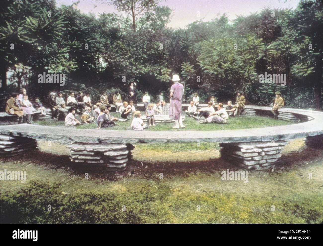 The Council Ring is shown in its use as a place for storytelling in ...