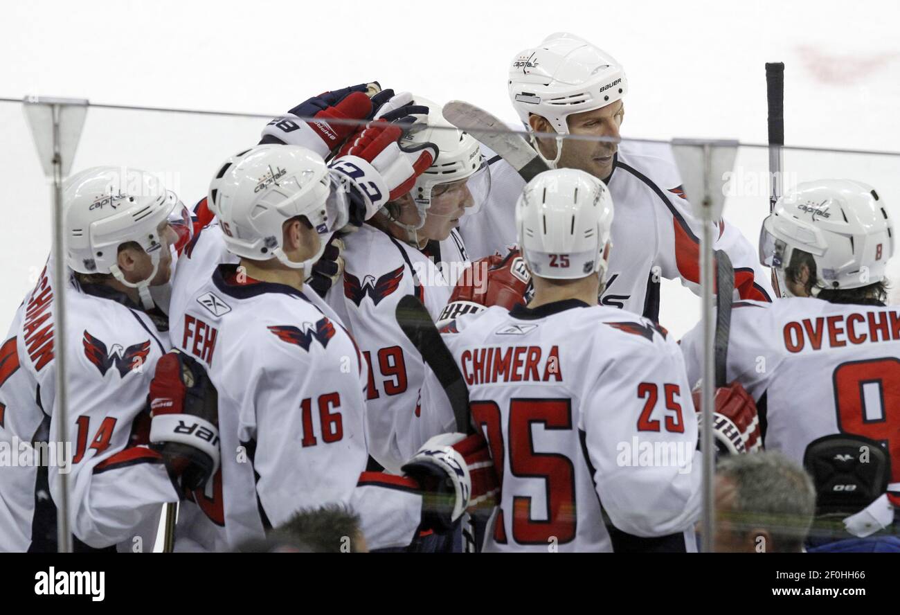 Washington Capitals center Nicklas Backstrom (19) joins teammates in ...