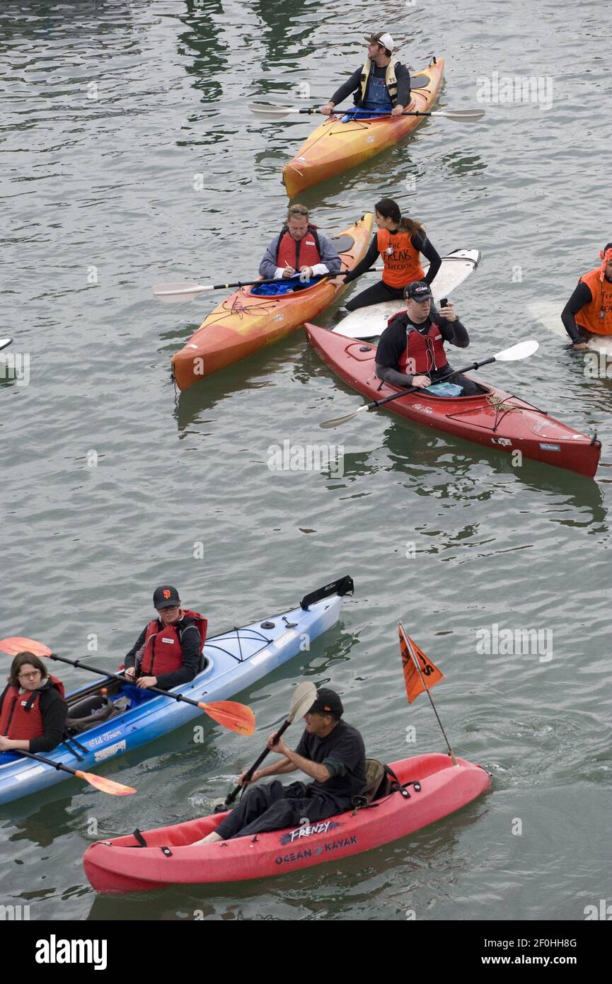 Los Angeles Times reporter Chris Erskine, center, in orange kayak ...