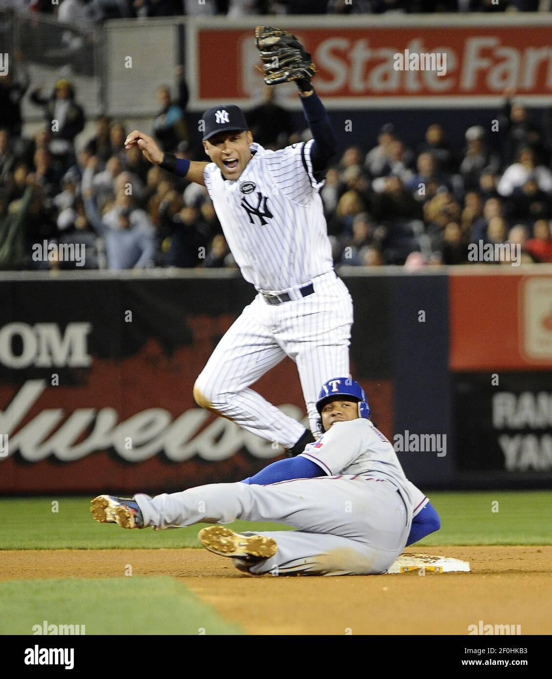 New York Yankees Derek Jeter reacts after tagging out Texas Rangers ...