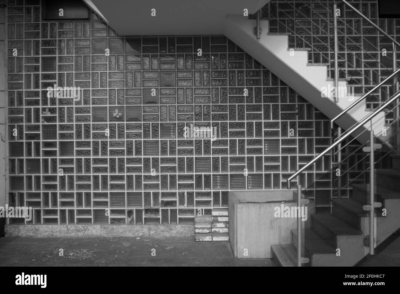 70s glas wall with concrete stair way Stock Photo - Alamy