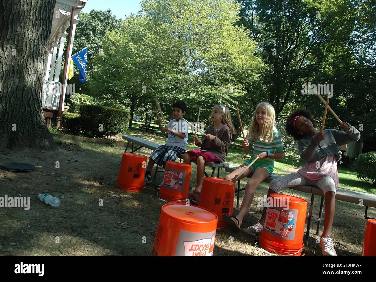 Kids practice drumming at a day camp in the Nolan Park area of Governor ...