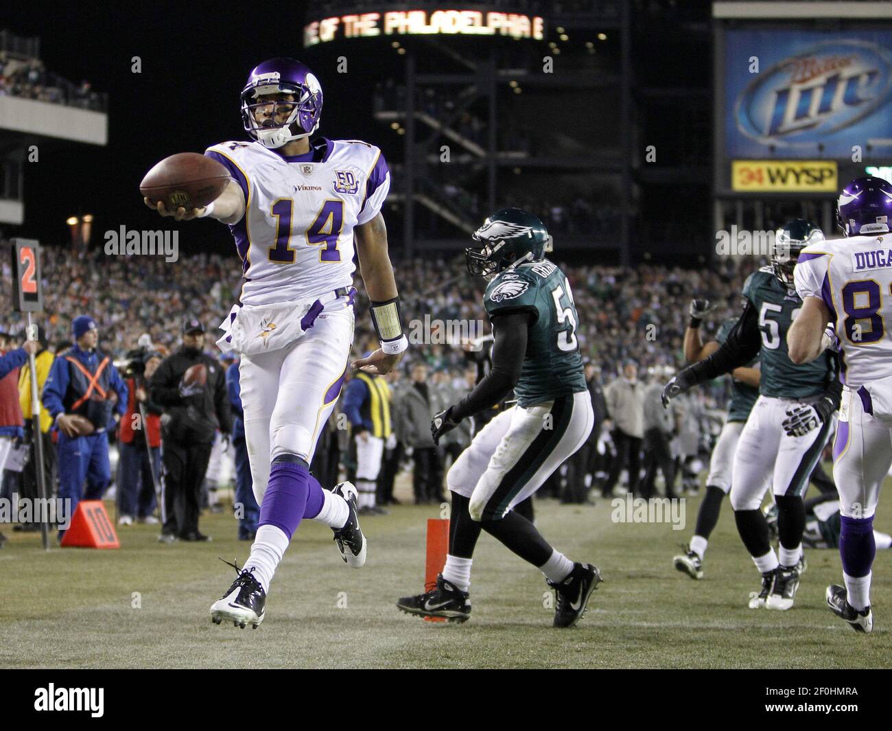 Minnesota Vikings quarterback Joe Webb (14) runs in a 9-yard touchdown ...