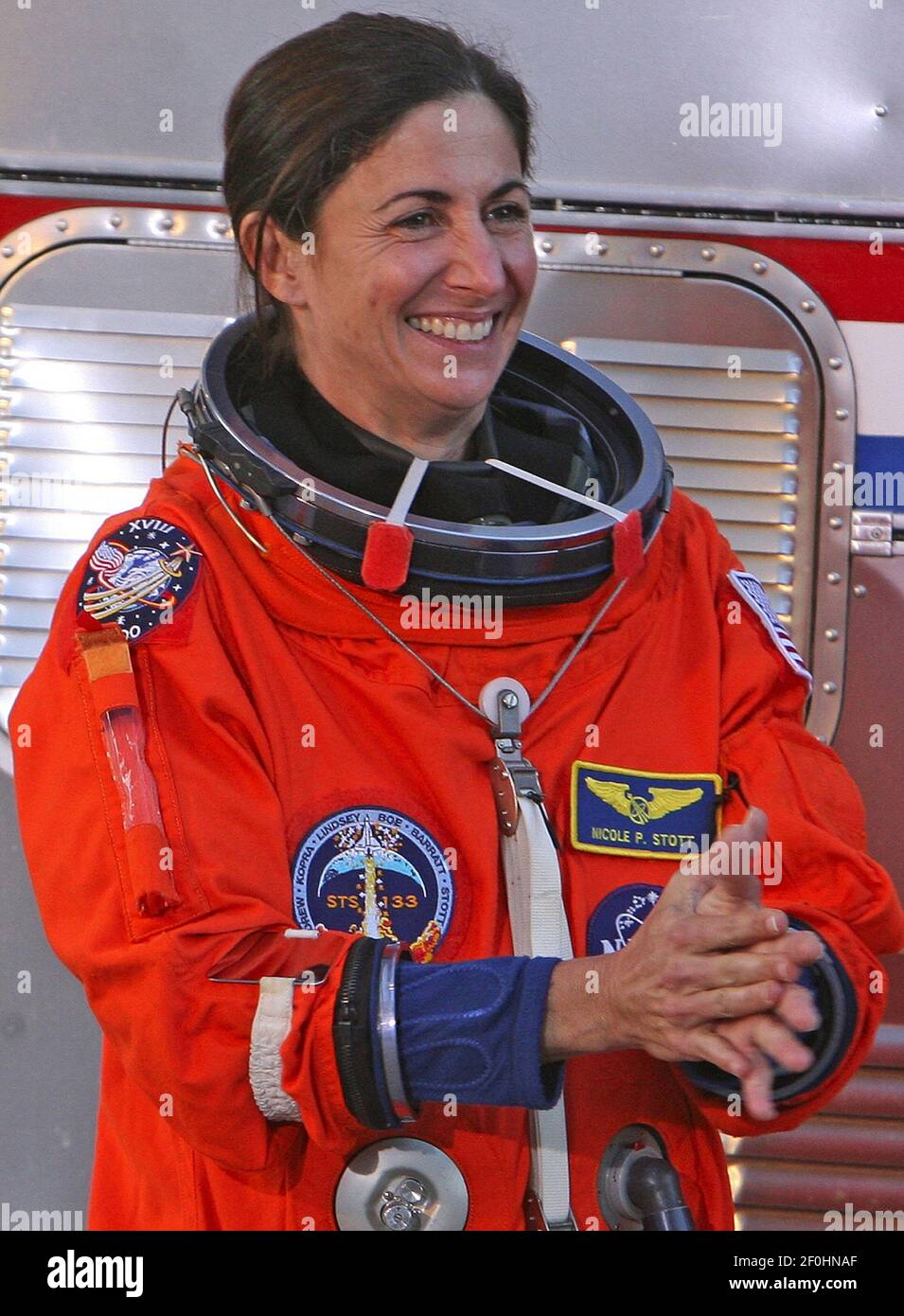 Nicole Stott and other crew members of space shuttle Discovery STS-133 ...