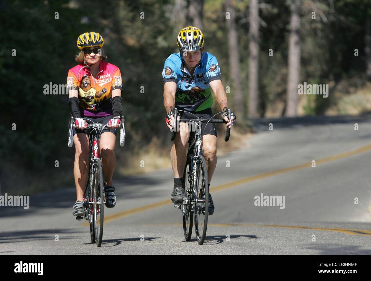 John and Joyce Van Ornum ride their bikes near their home at Bass Lake ...
