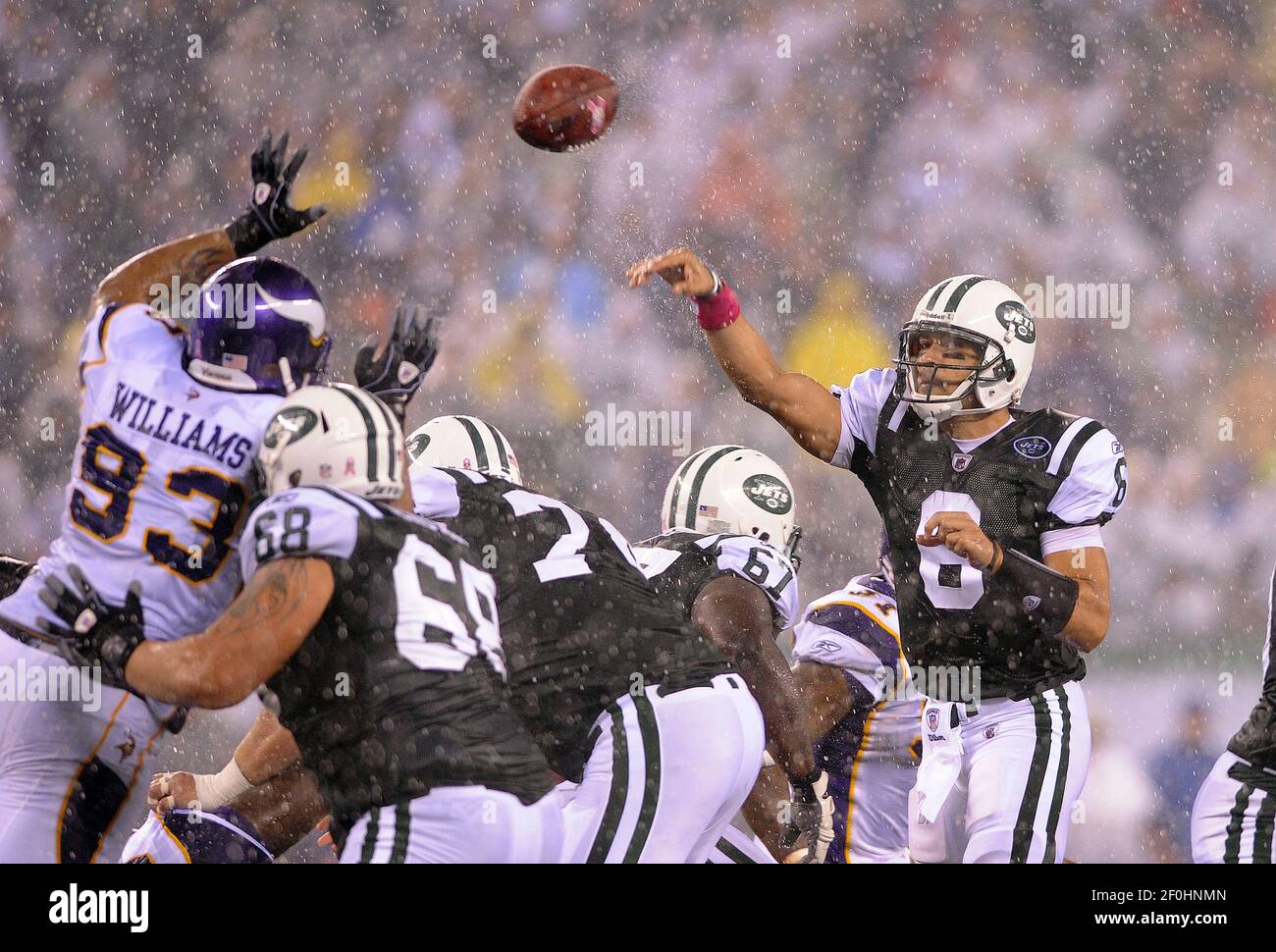 New York Jets Mark Sanchez throws a pass against the Minnesota Vikings ...