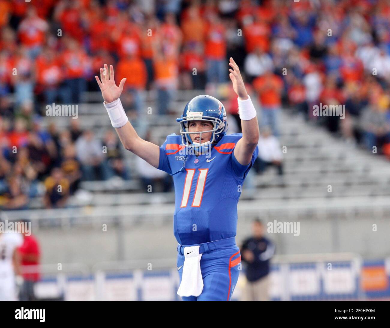 Boise State quarterback Kellen Moore celebrates a first-half run by ...