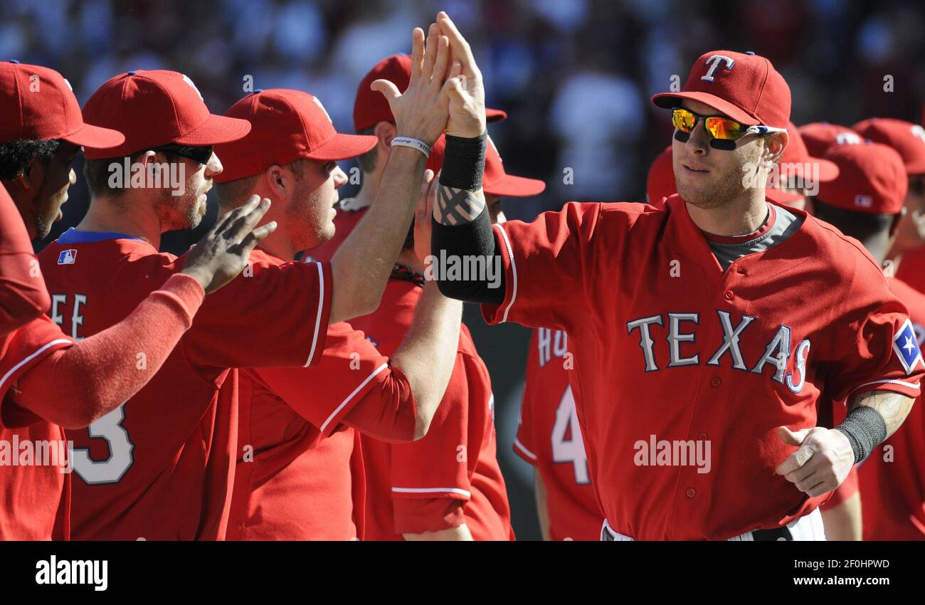 Texas Rangers outfielder Josh Hamilton , right, during inroductions ...