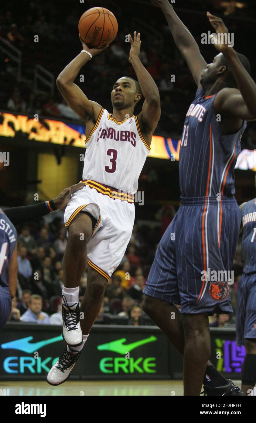 Cleveland Cavaliers' Ramon Sessions (3) shoots as Charlotte Bobcats ...