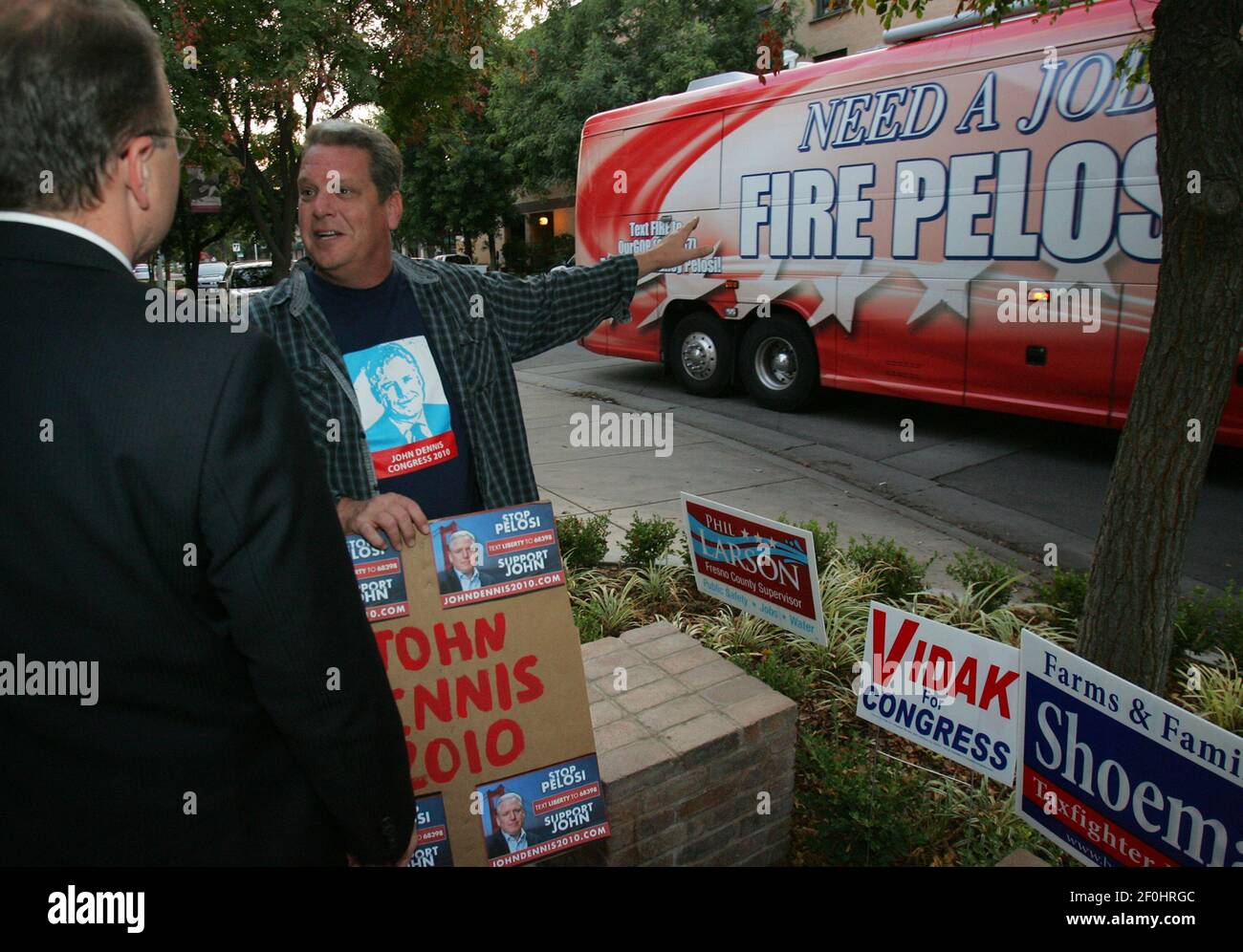 Steve Wayte, a member of the Central Valley Tea Party, points to the ...