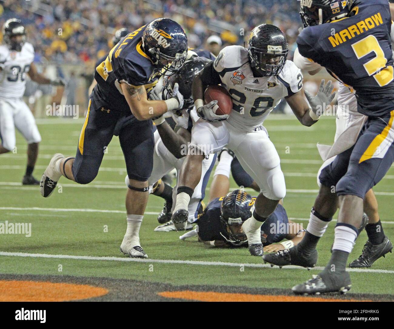 FIU's Derrick Perry runs into the end zone, as he score a third-quarter ...