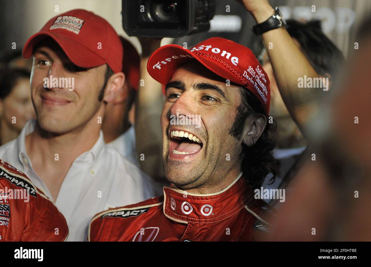Dario Franchitti celebrates winning the Izod Indycar Series ...