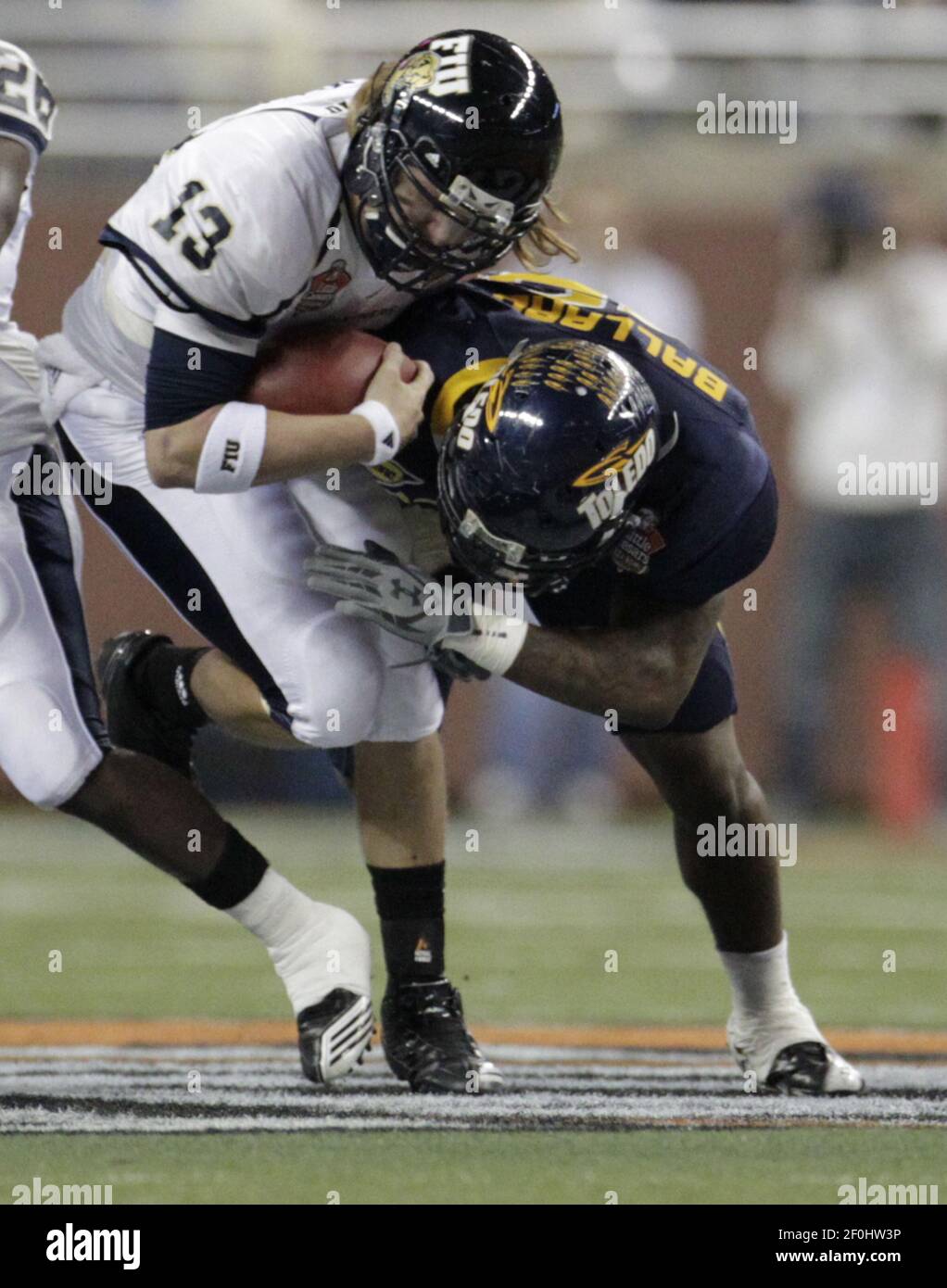 The Panthers' Wesley Carroll earns a first down, as he is stopped by ...