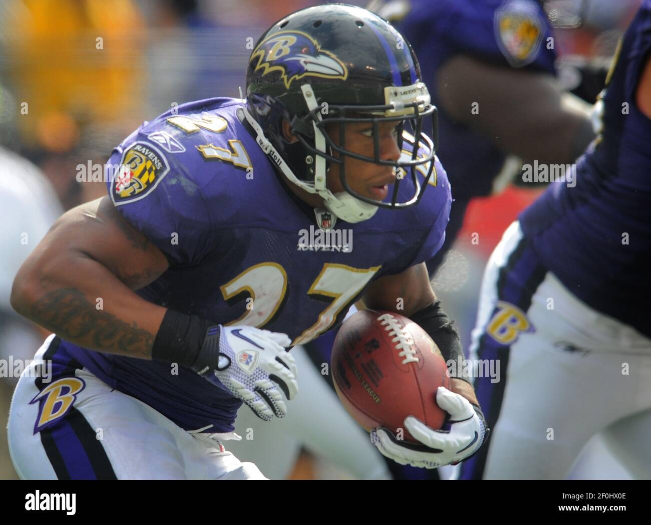 Baltimore Ravens running back Ray Rice looks for running room against ...