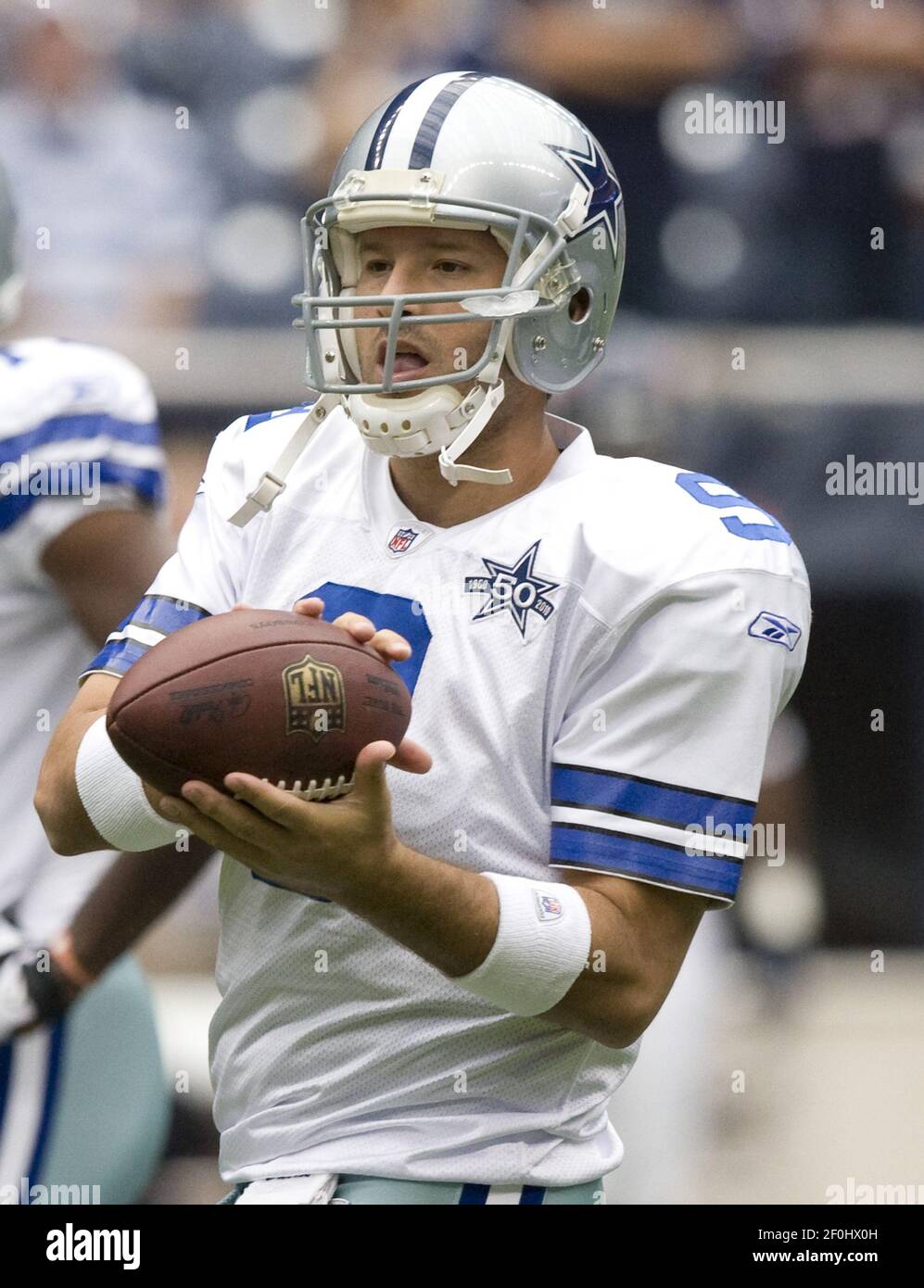 Dallas Cowboys quarterback Tony Romo (9) warms up before a game against ...
