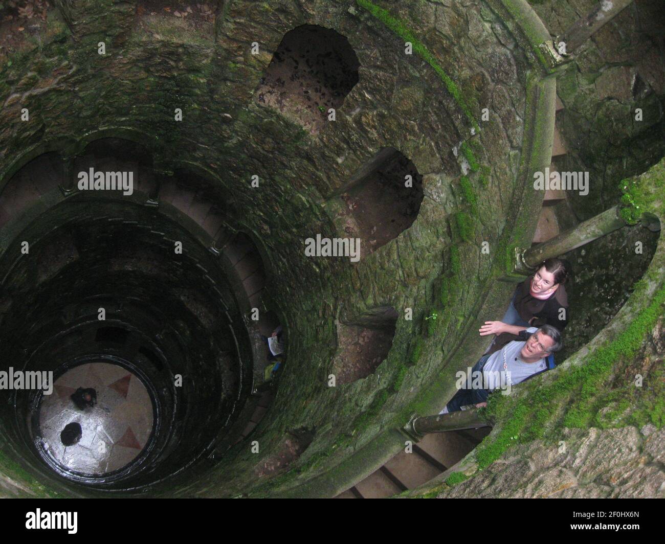 At Quinta da Regaleira in Sintra, Portugal, stairs inside the brick ...