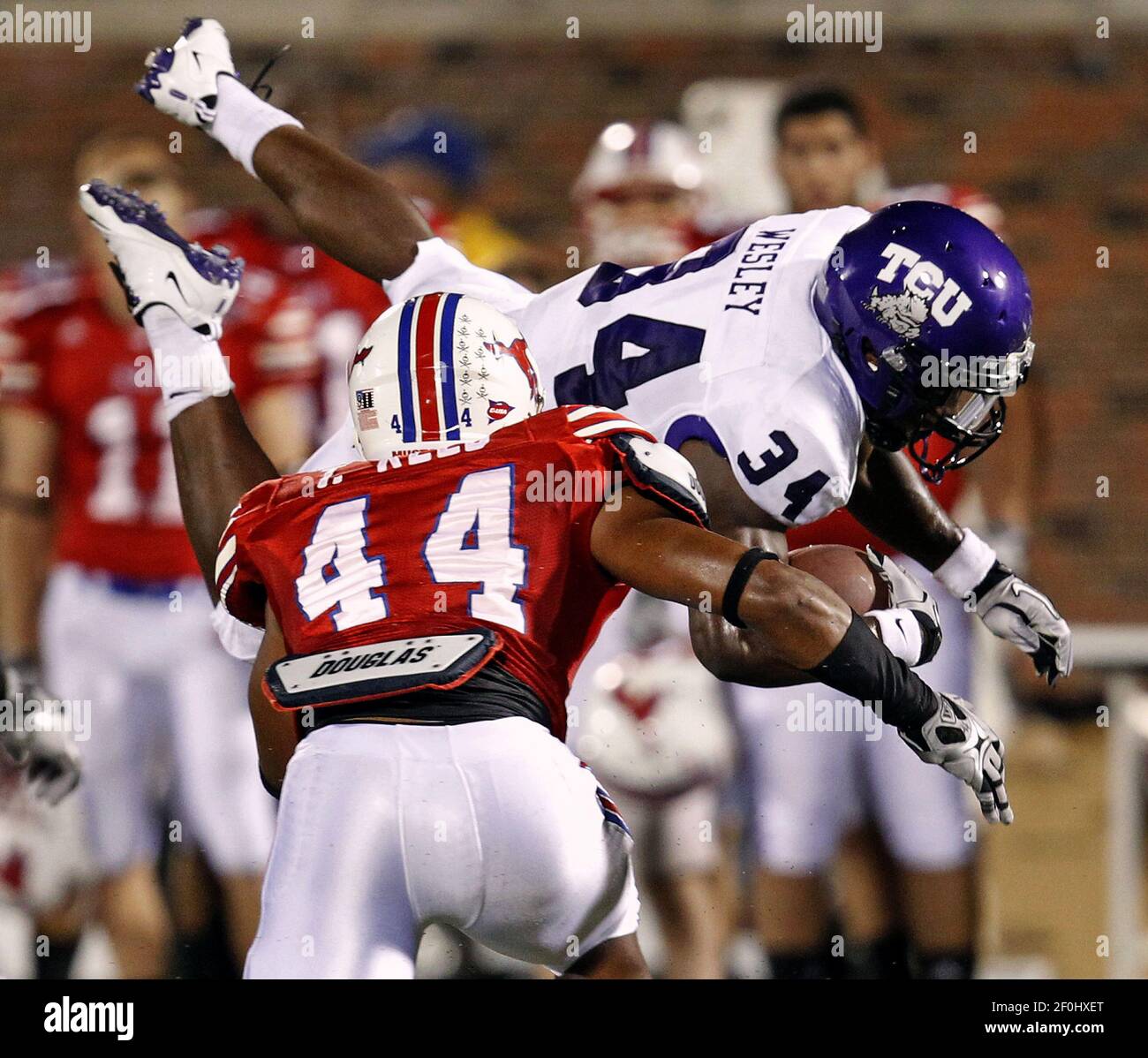 Texas Christian University tailback Ed Wesley (34) goes up high to ...