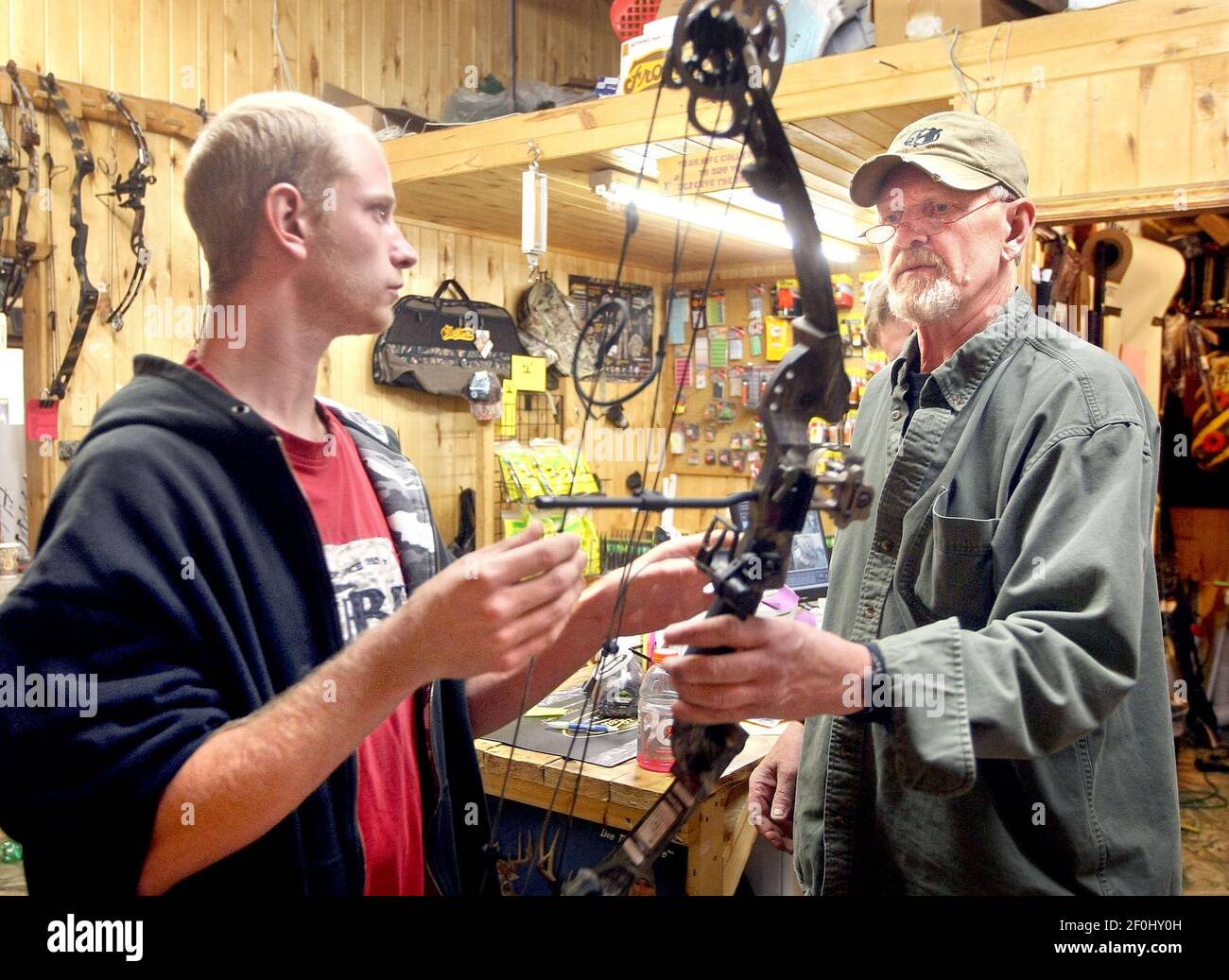 Casey Knase, left, of Duluth, Minnesota, talks to Chalstrom's Bait and ...